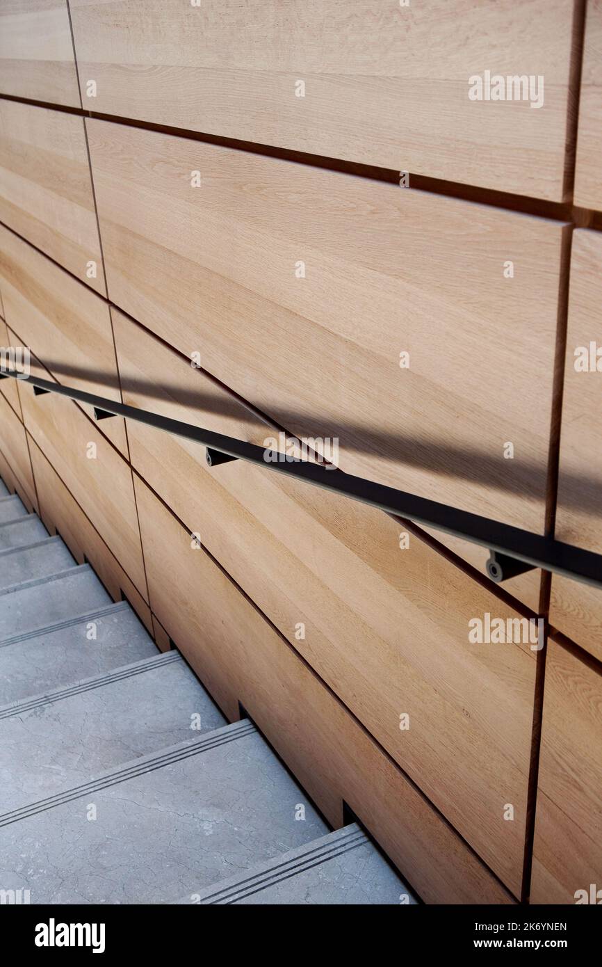 Wooden wall and modern stair railing in an interior Stock Photo - Alamy