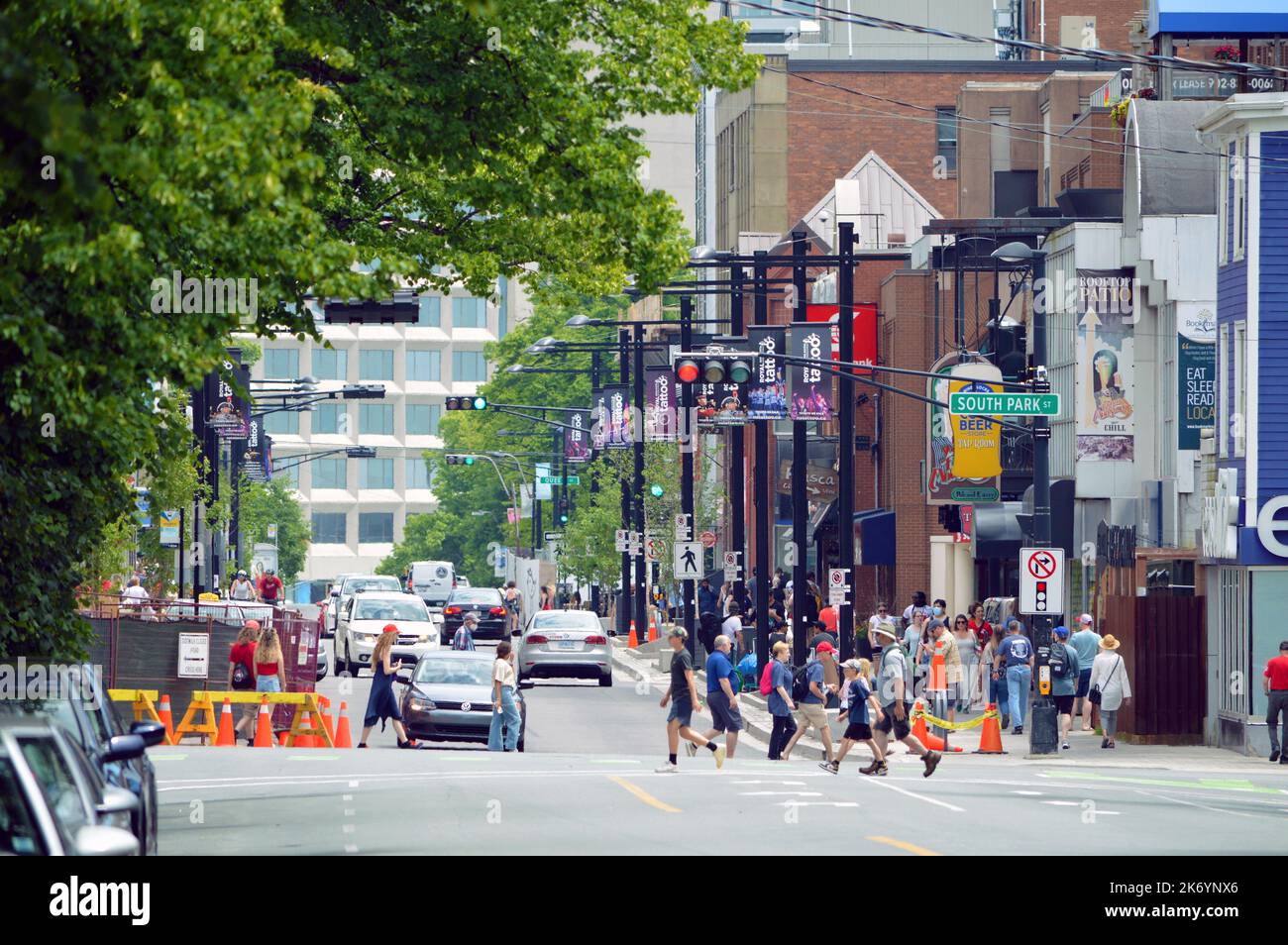 People and cars on Spring Garden Road, a commercial street in Halifax ...