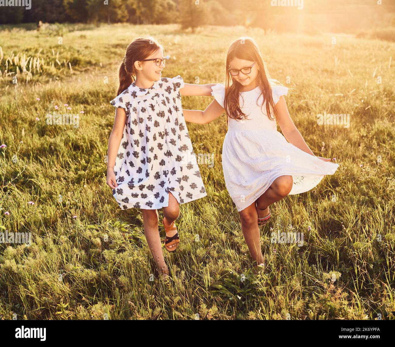 child summer fun lifestyle sister friend outdoor girl field friendship ...