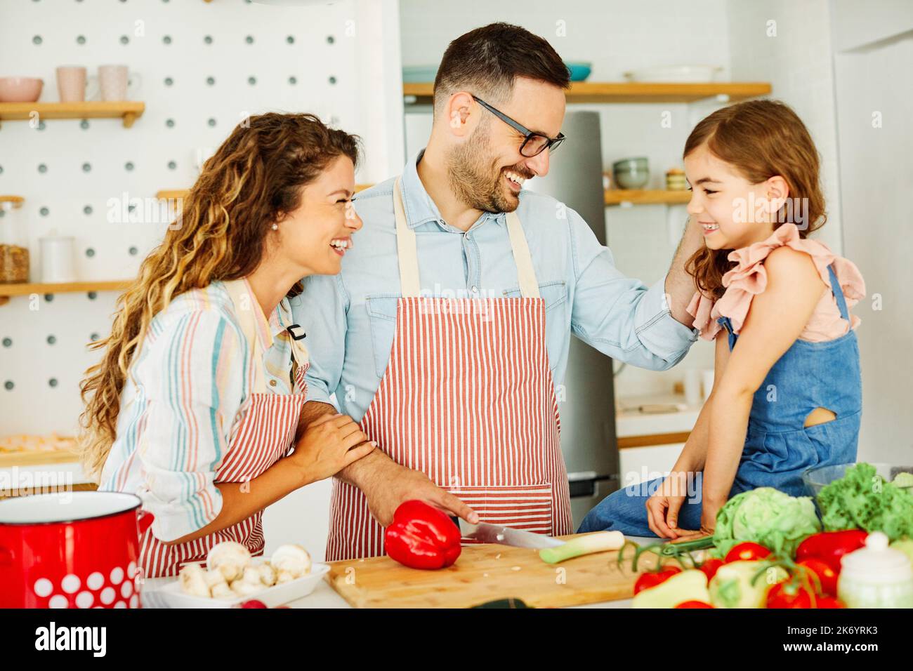 family child kitchen food daughter mother father cooking preparing ...