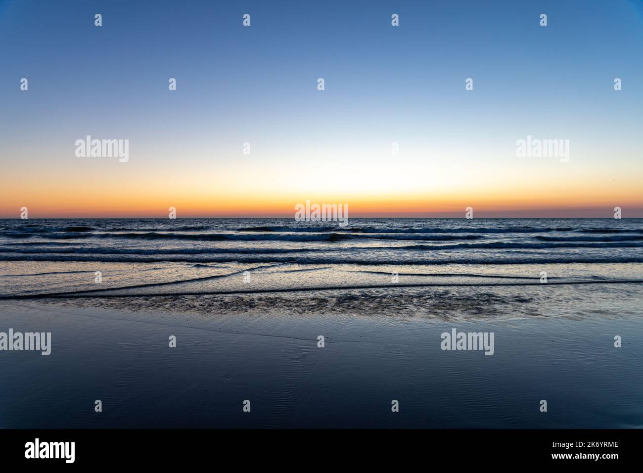 Sundown at the Dutch coastline between Noordwijk and Zandvoort. On the ...