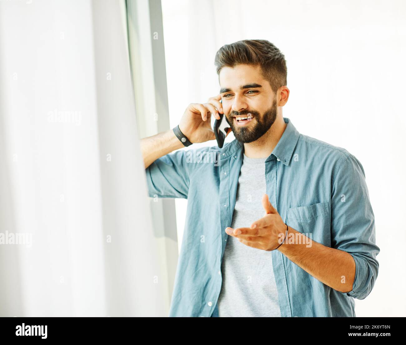 Confident smiling male model hi-res stock photography and images - Alamy