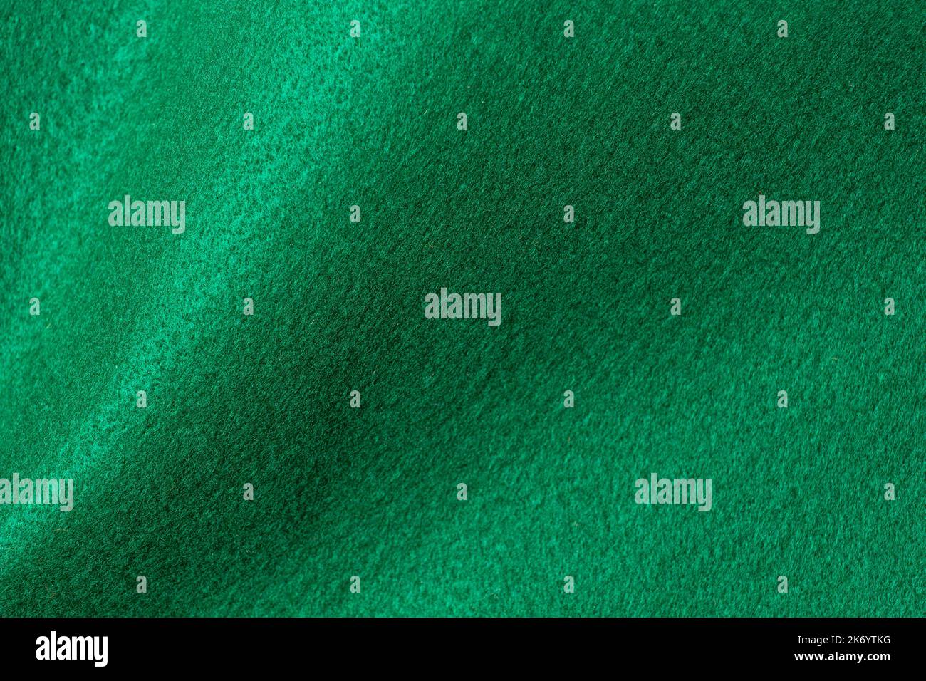 Green hue color felt textile fabric texture background. Abstract ...