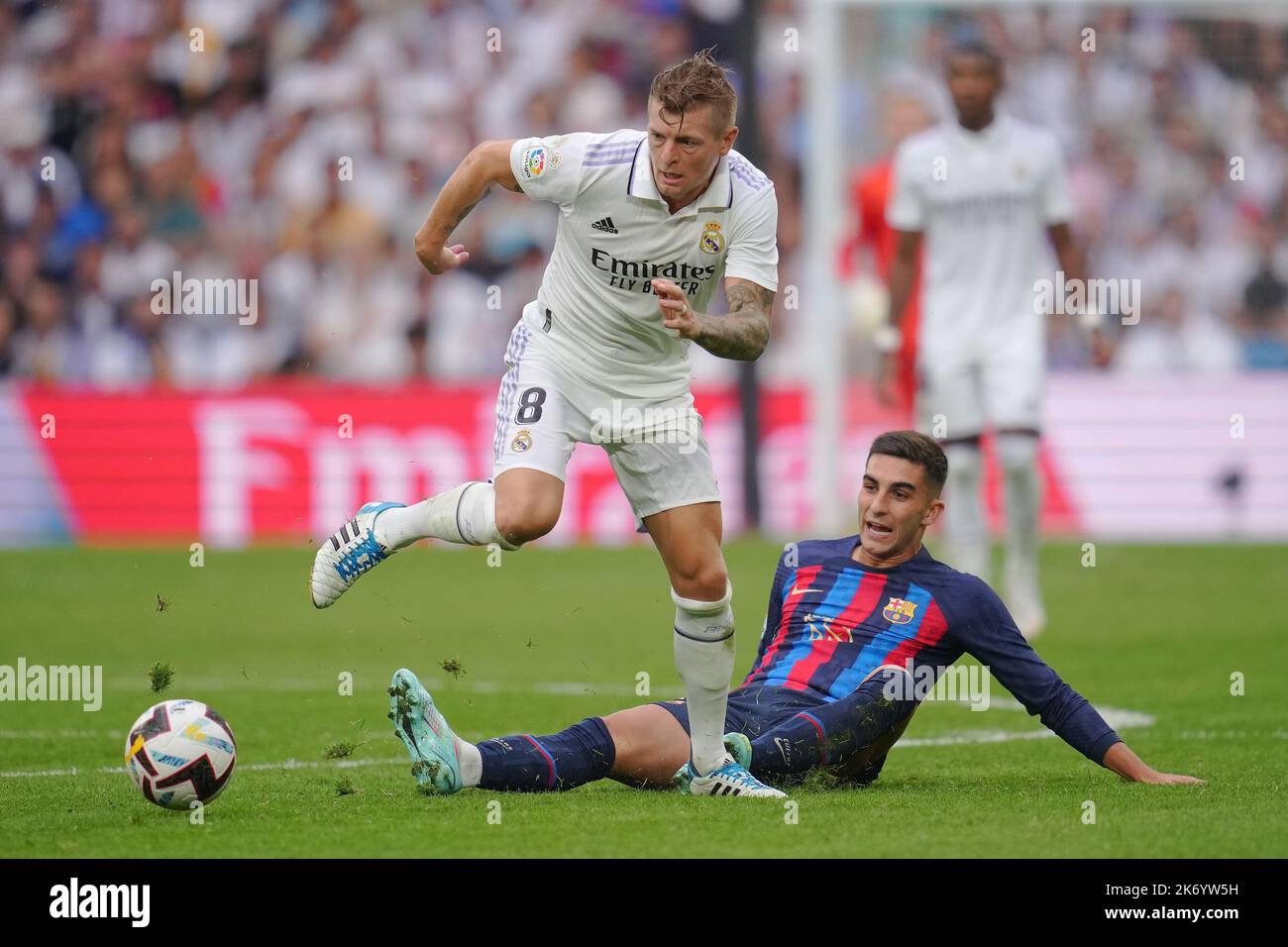 Toni Kroos of Real Madrid and Ferran Torres of FC Barcelona during the ...