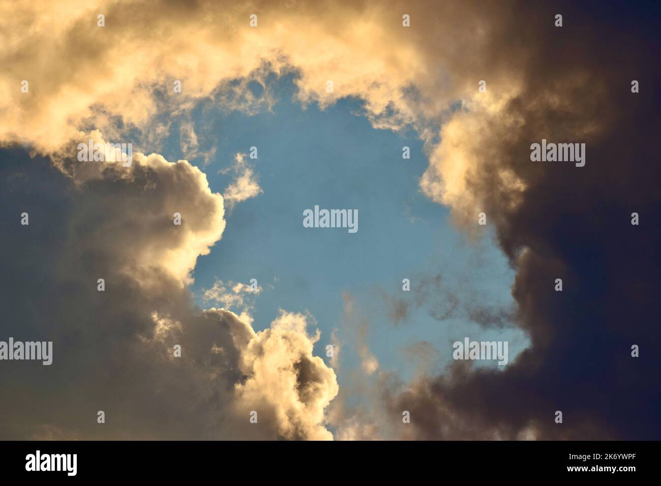 Backlit cumulus clouds at sunrise on Ambergris Caye, Belize, Central ...