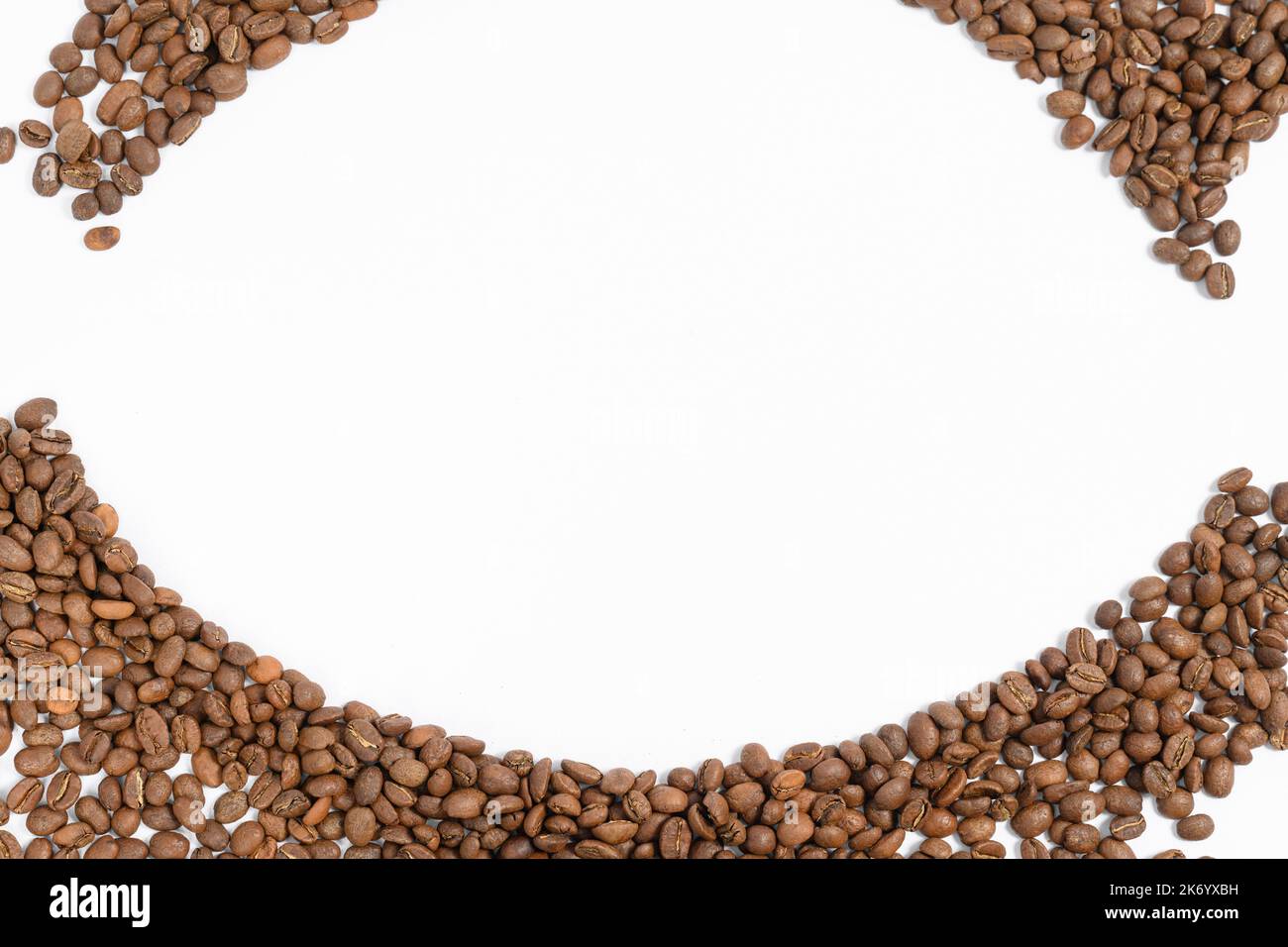 Circle frame of coffee beans isolated on white background, example for ...