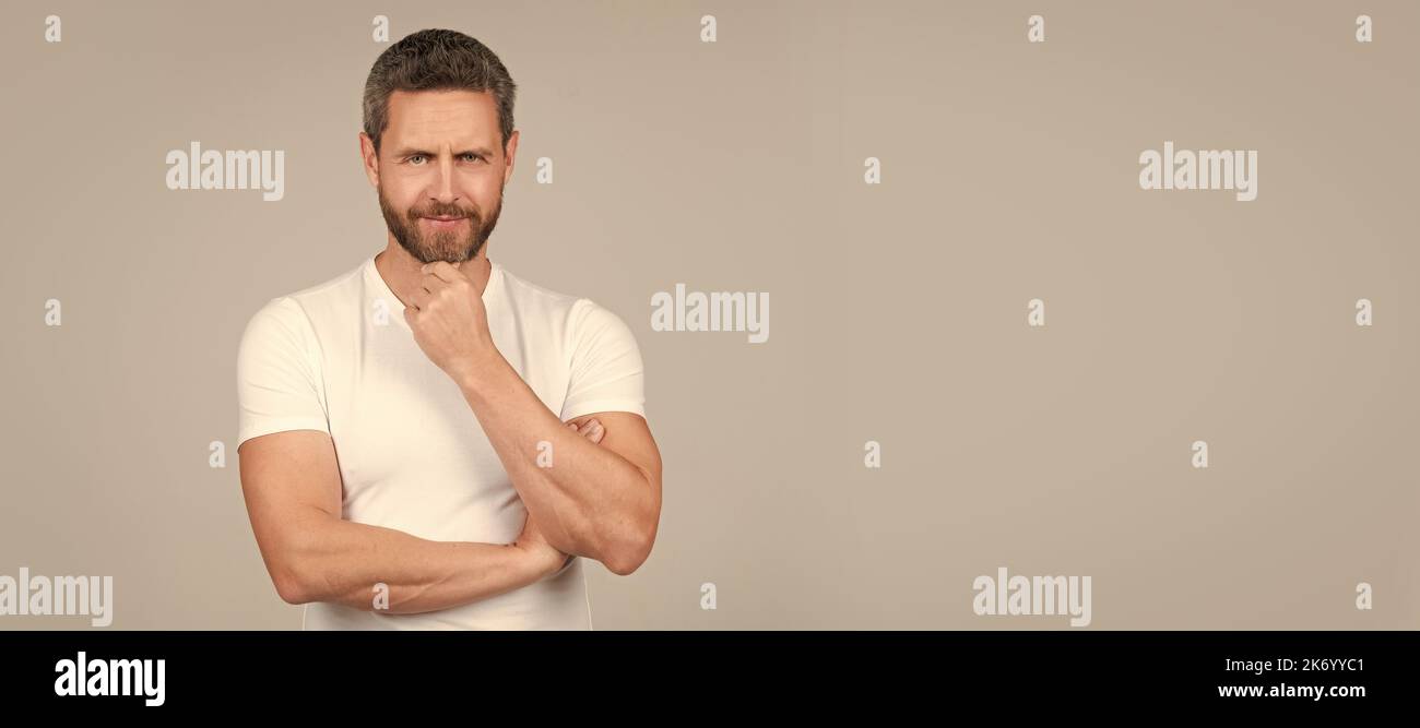 I am what I think. Thoughtful man grey background. Serious guy think ...