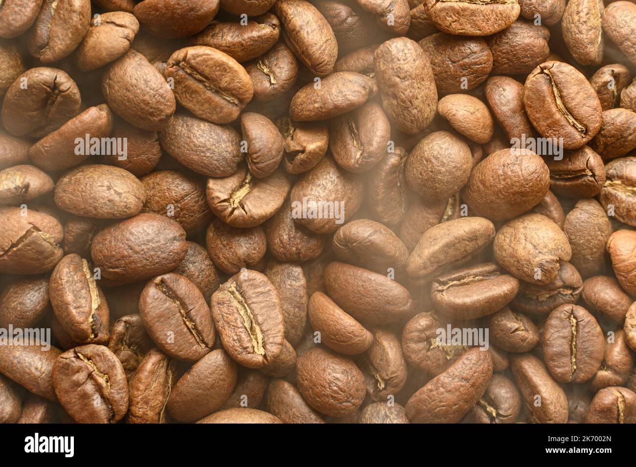 The texture of freshly roasted, ready-to-drink coffee, steam rising ...