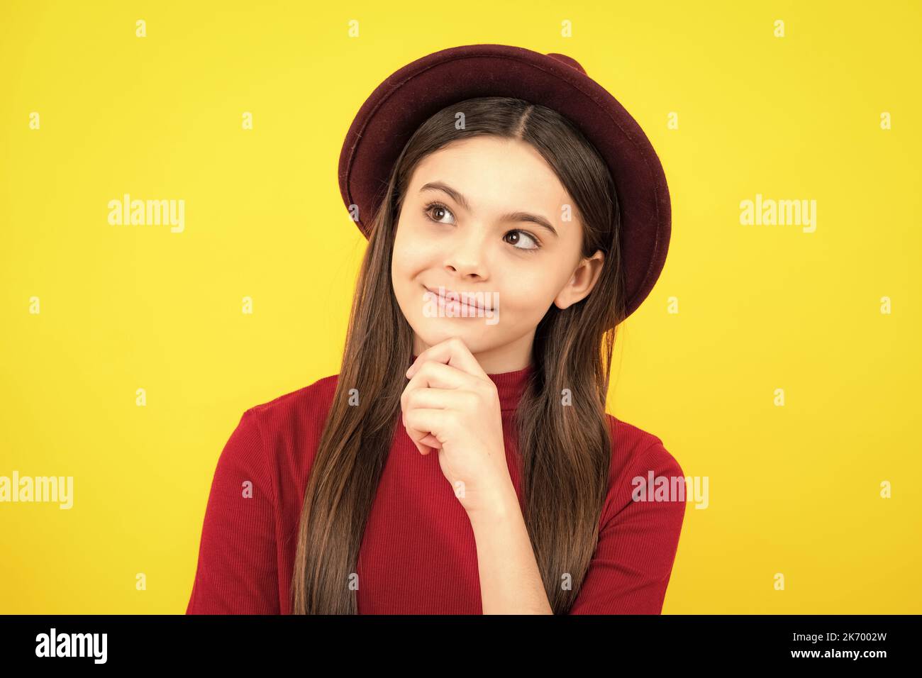 Happy teenager portrait. Thoughtful teenager girl touch chin and thinking, pensive child making ...