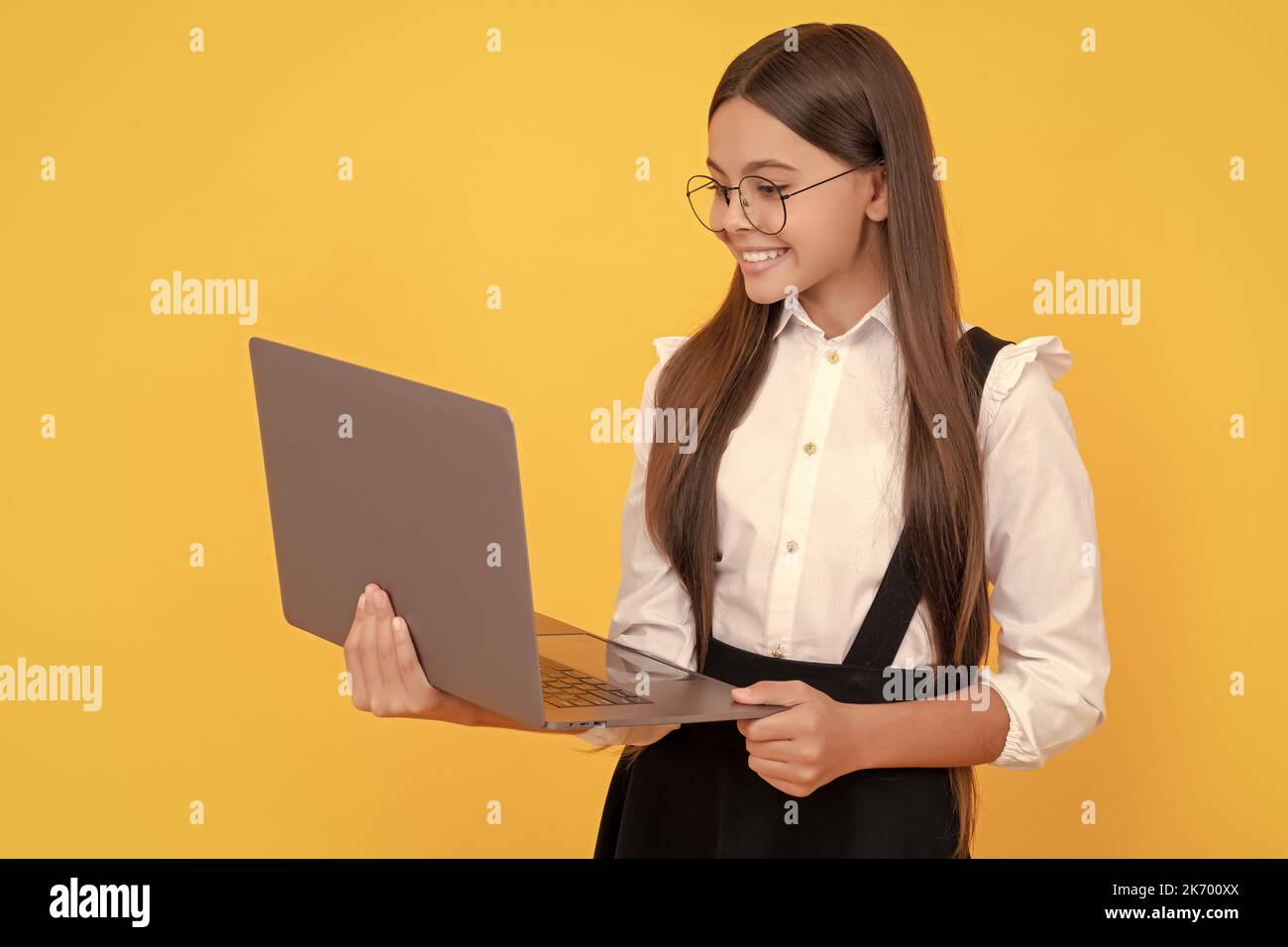 cheerful child study online. computer vision syndrome. nerd typing ...