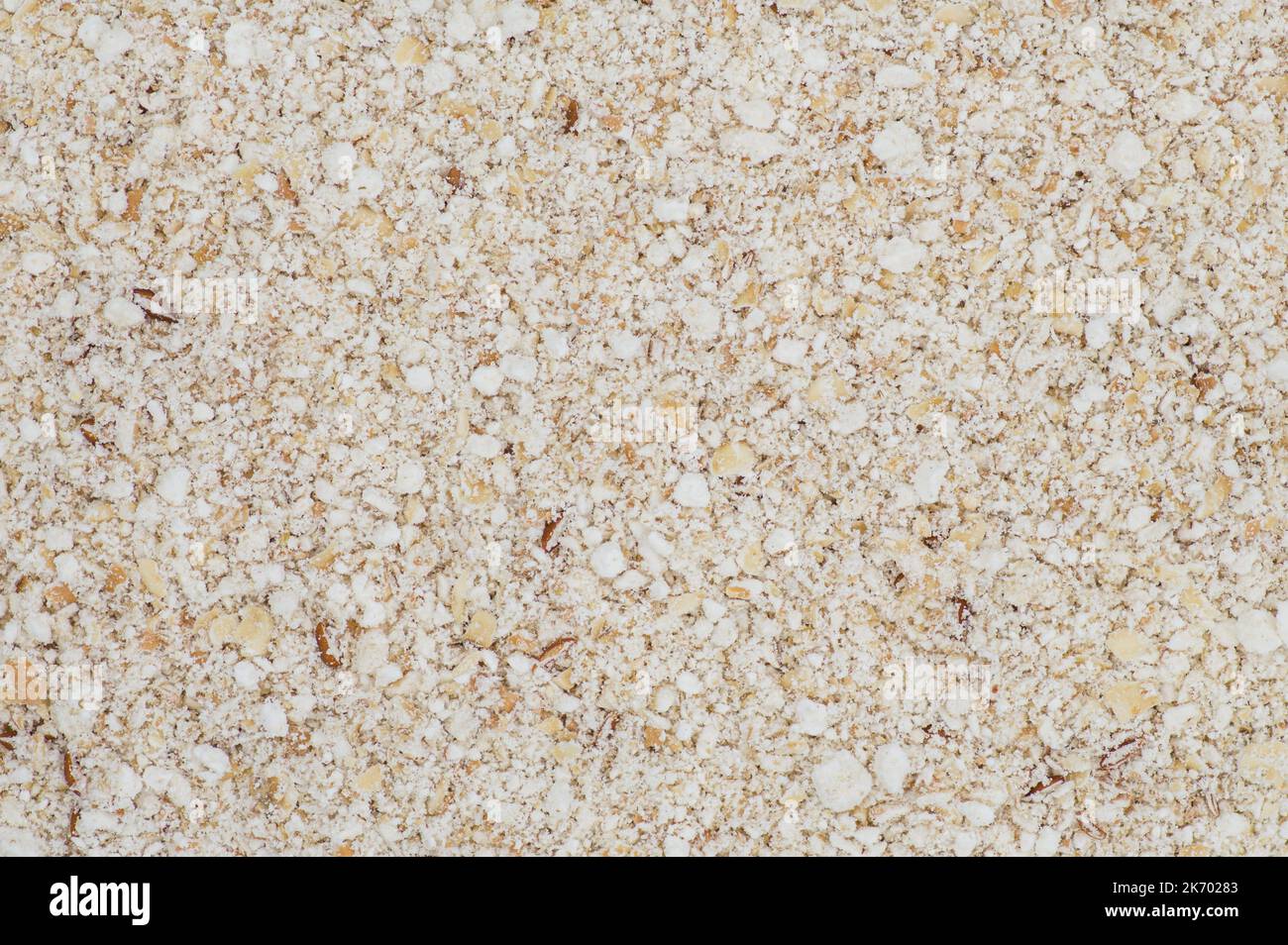 High angle full-frame photo of ground oats making pattern for ...