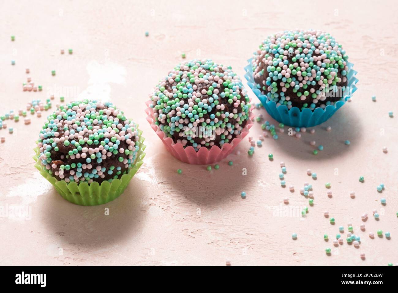 chocolate ball covered with colorful sugar sprinkles Stock Photo - Alamy