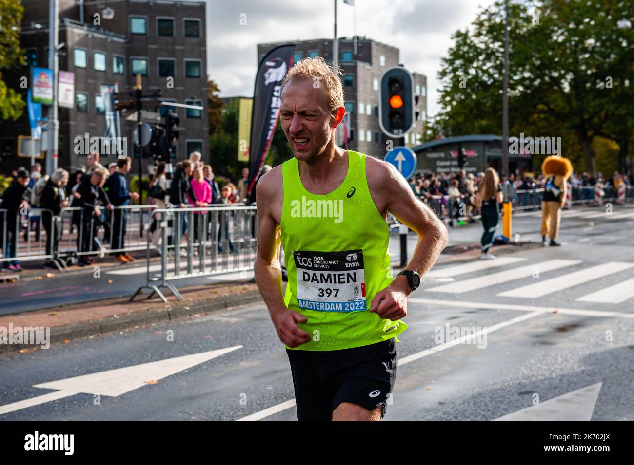 A participant is seen running in pain the last kilometers. More than ...