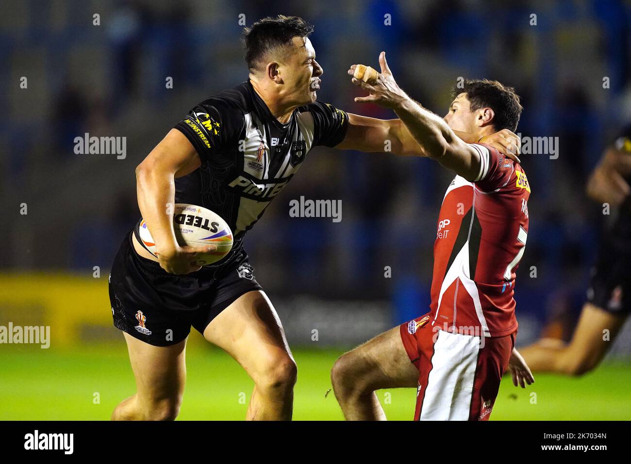 New Zeland's Joseph Manu (left) breaks free of Lebanon's Mitchell Moses ...
