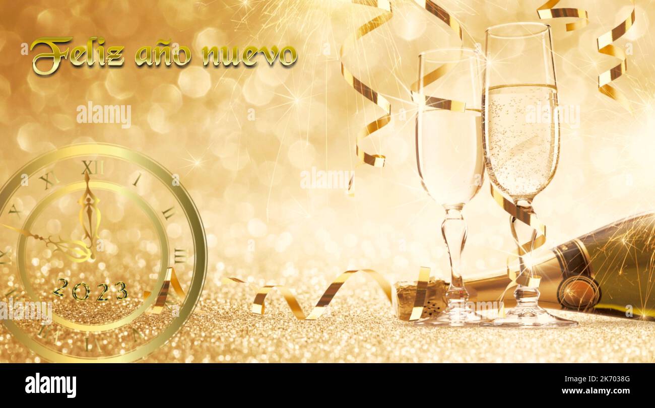 Happy new year 2023 greeting card with bokeh lights, fireworks and champagne glasses in Spanish ...