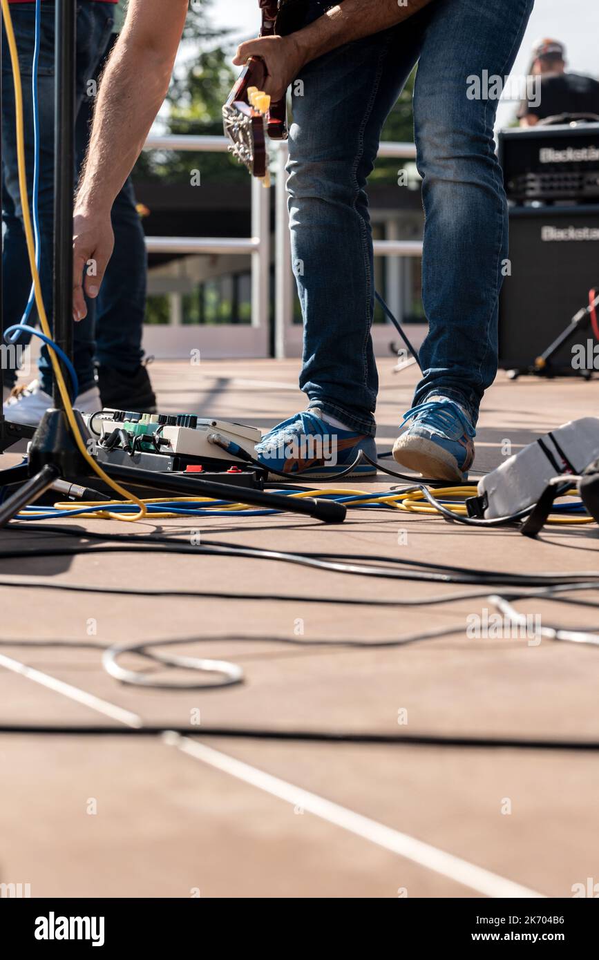 People preparing the technical means for a musical performance at a ...