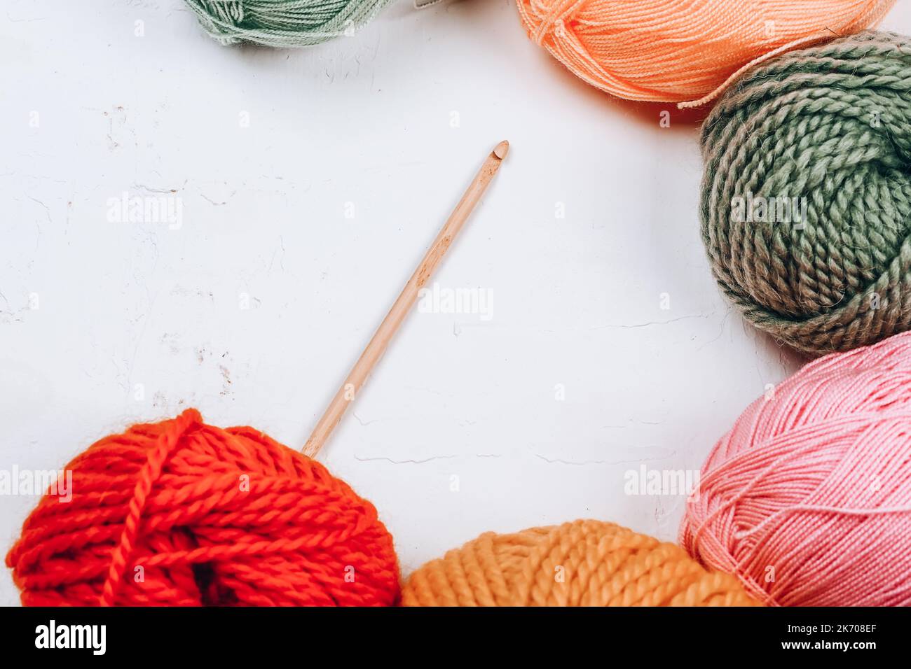 Craft hobby background with yarn in autumn colors. Recomforting ...