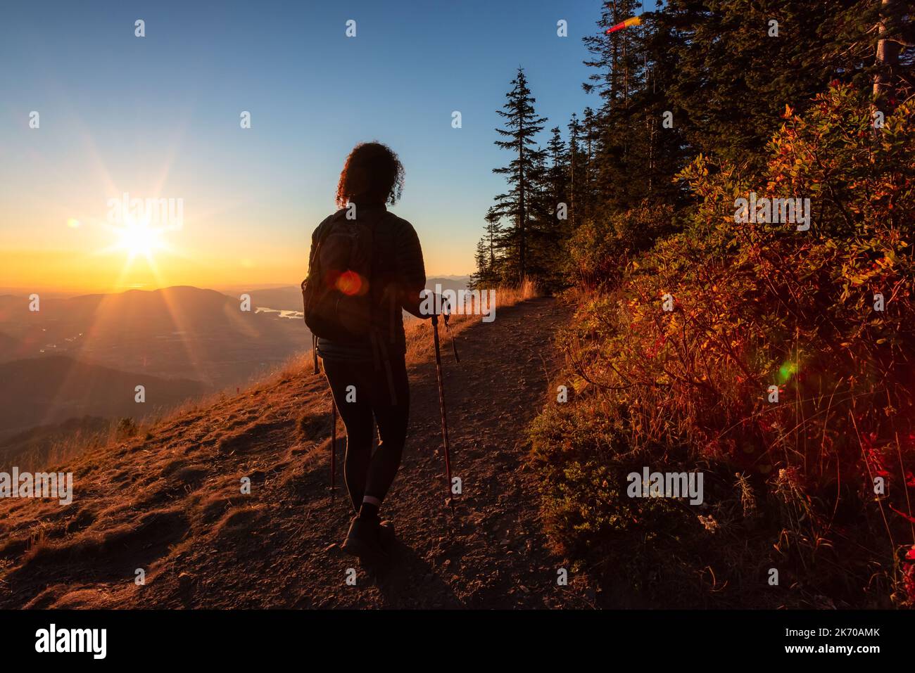 Adventurous Woman Hiking in Canadian Landscape with Fall Colors during ...