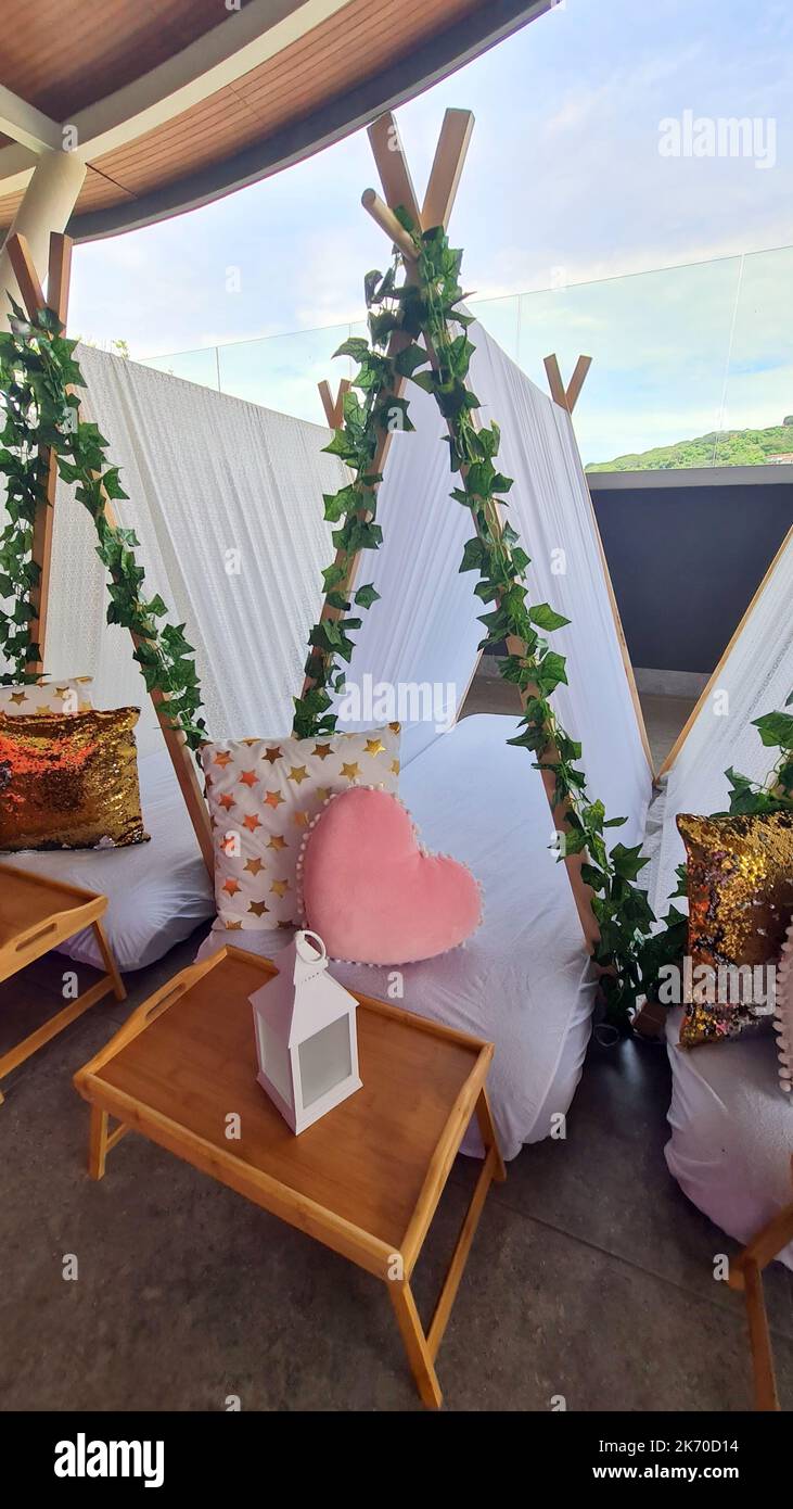 Childrens party teepe or tent with pink flowers and decorations Stock ...
