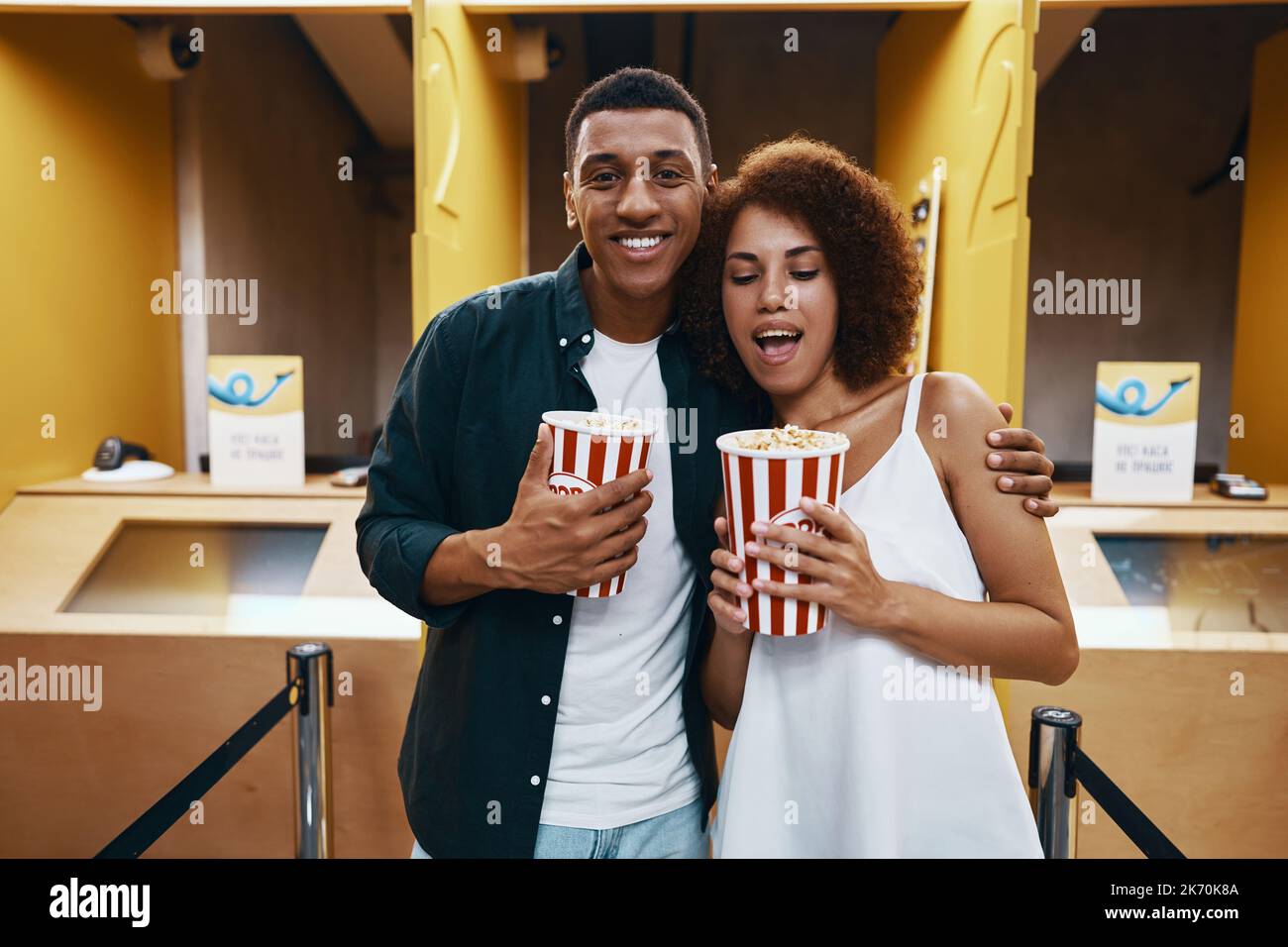 People came to the premiere of the film with popcorn. Happy couple at ...