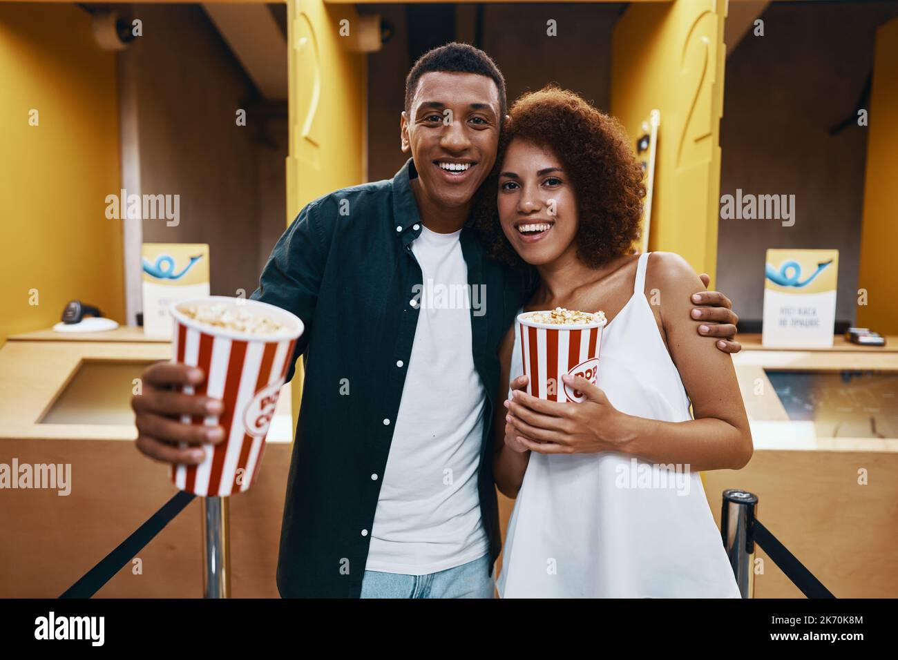 People came to the premiere of the film with popcorn. Happy couple at ...