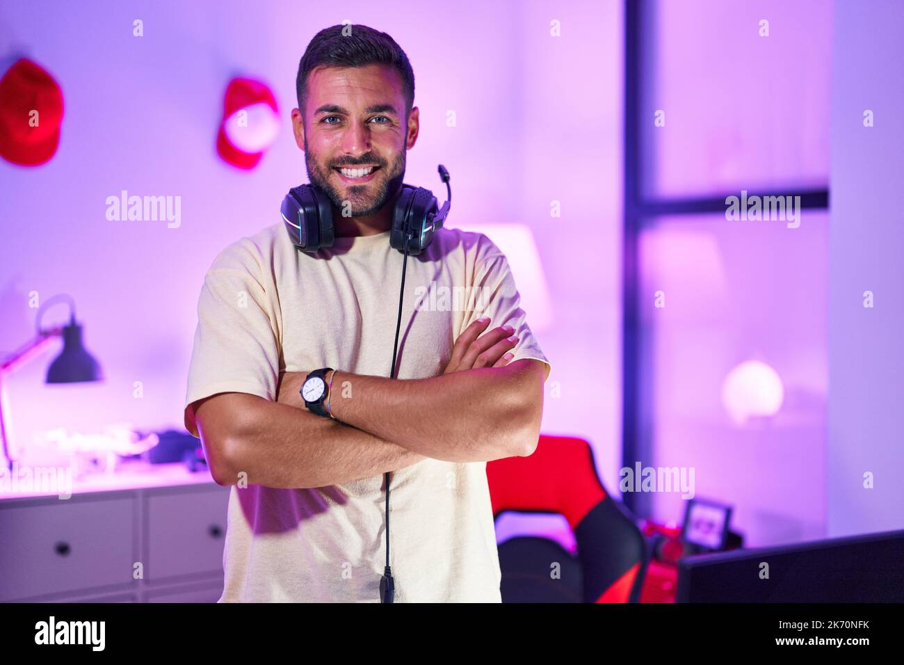 Young hispanic man streamer smiling confident standing with arms ...
