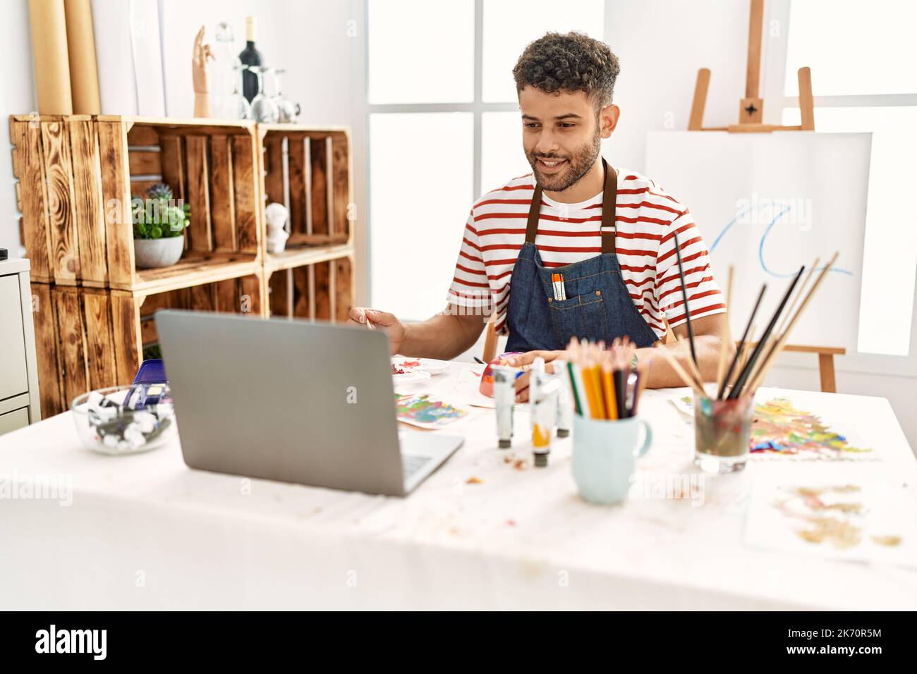 Young arab man artist drawing hi-res stock photography and images - Alamy