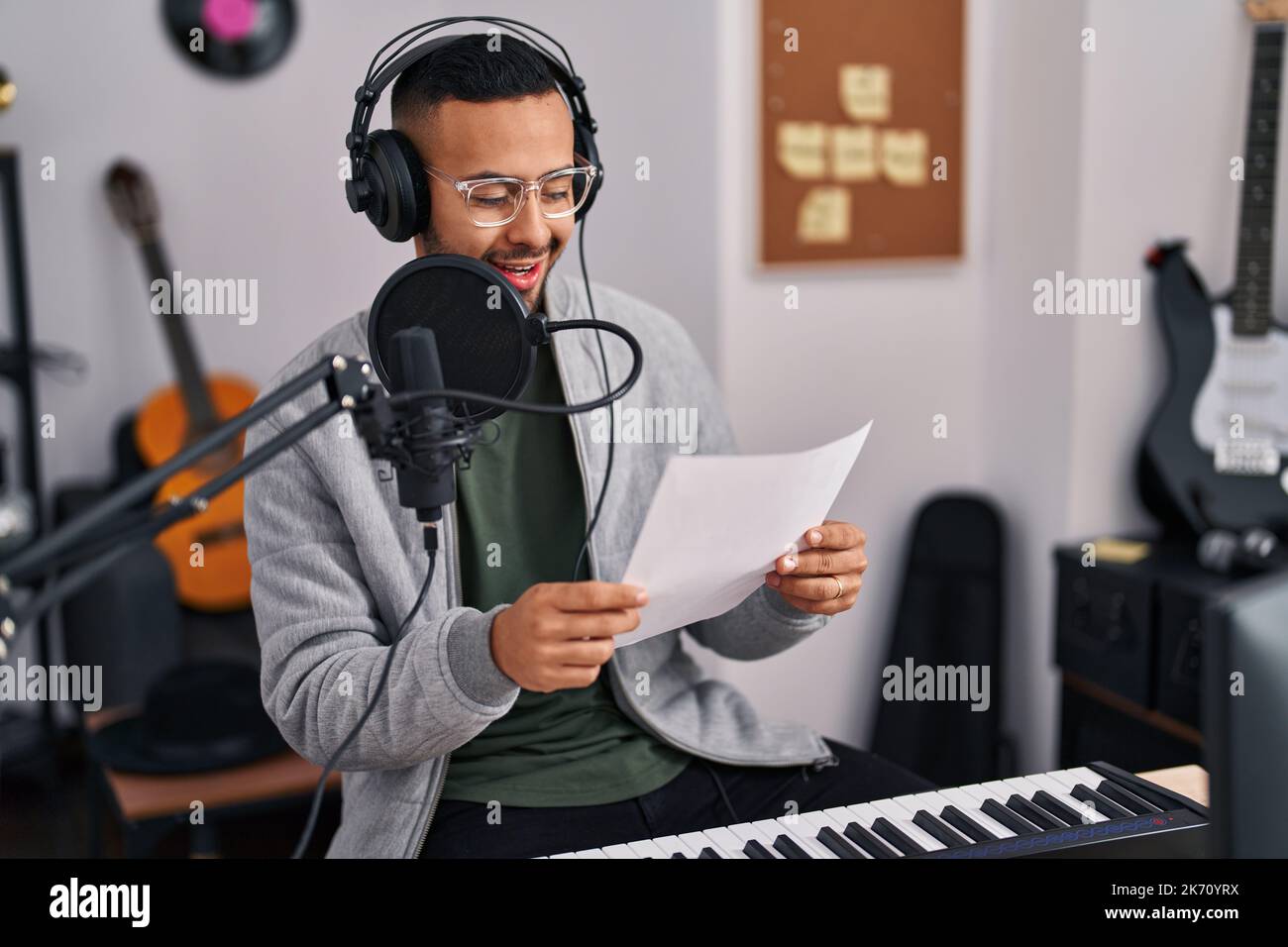 African american man artist singing song at music studio Stock Photo ...