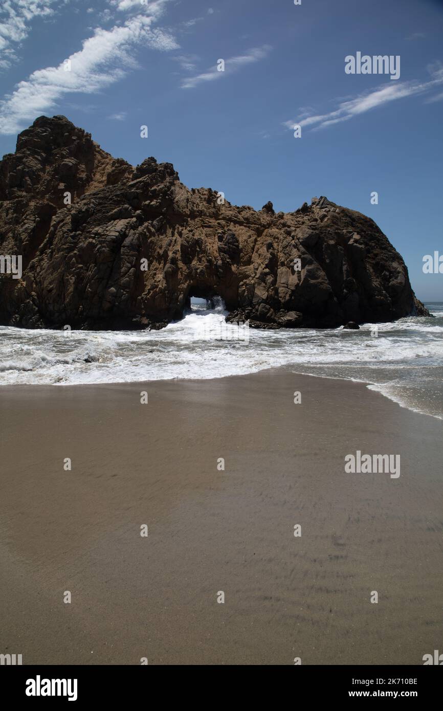 Surf crashes through rock formations at Pfeiffer Beach Stock Photo - Alamy