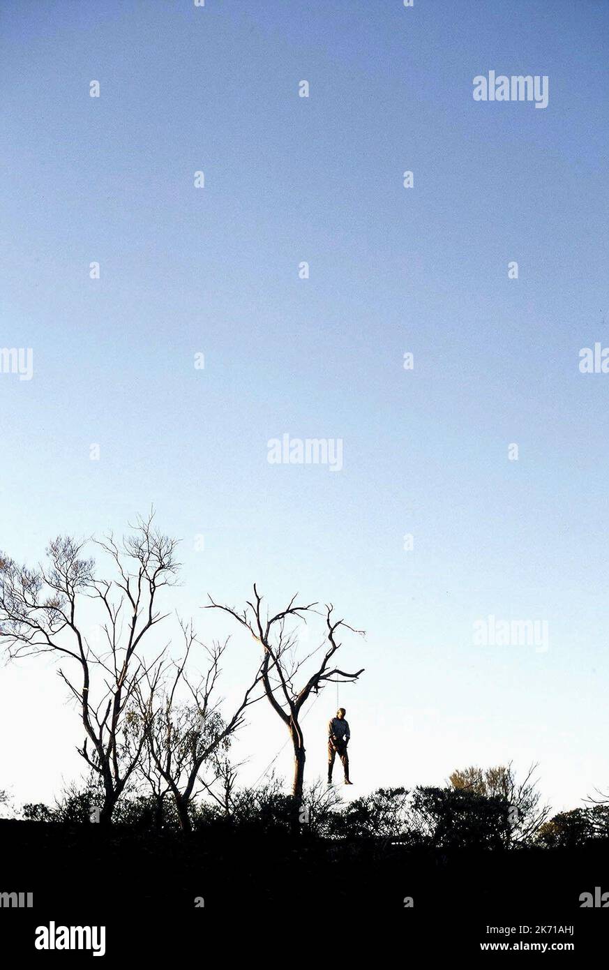 MAN HANGING FROM TREE, THE TRACKER, 2002 Stock Photo - Alamy