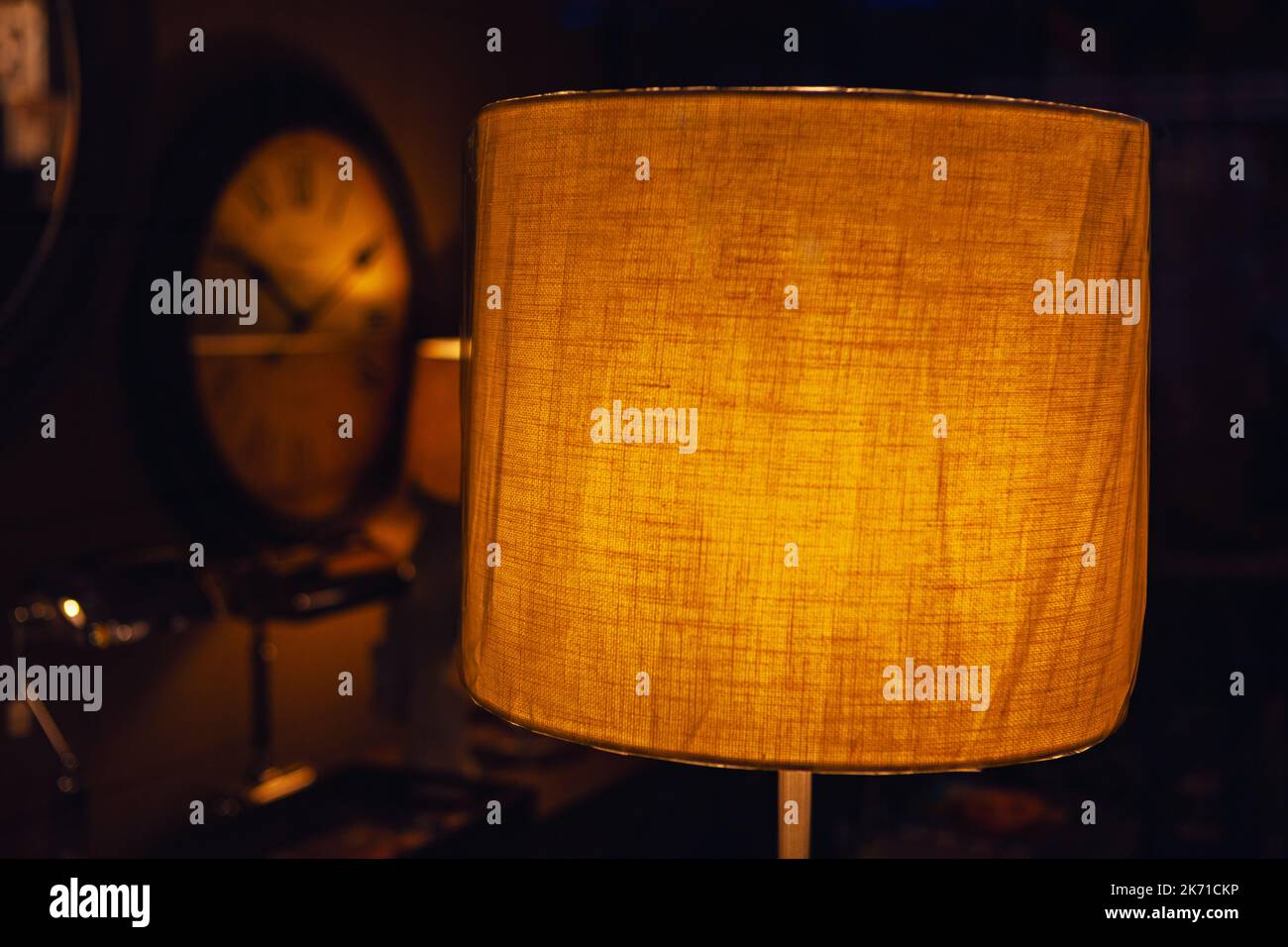 Cozy room interior with the lampshade . Bedroom in low light Stock ...