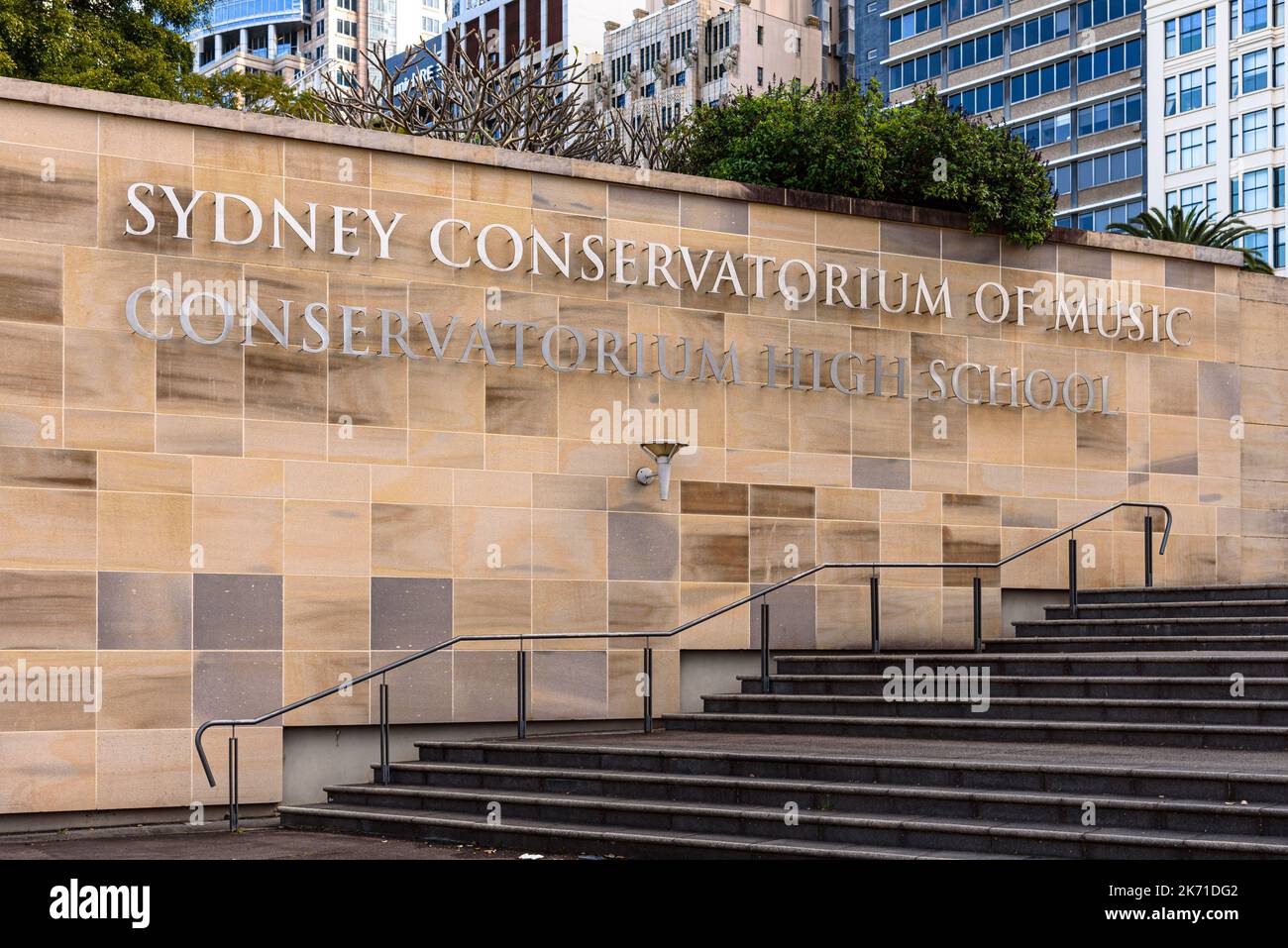 A sign for the Sydney Conservatorium of Music on a wall by the ...