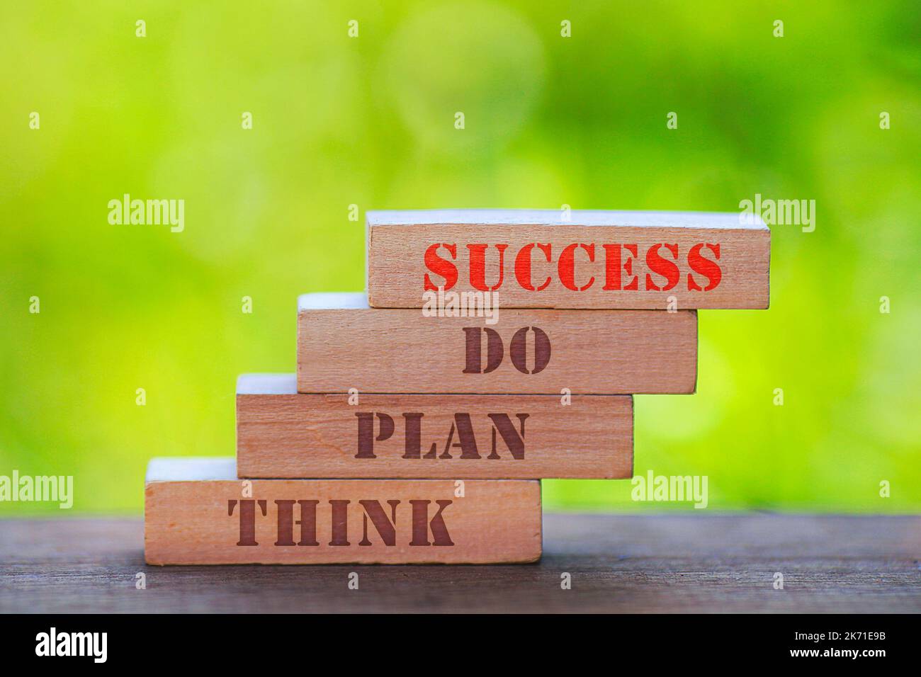 Successful steps on wooden block Stock Photo - Alamy