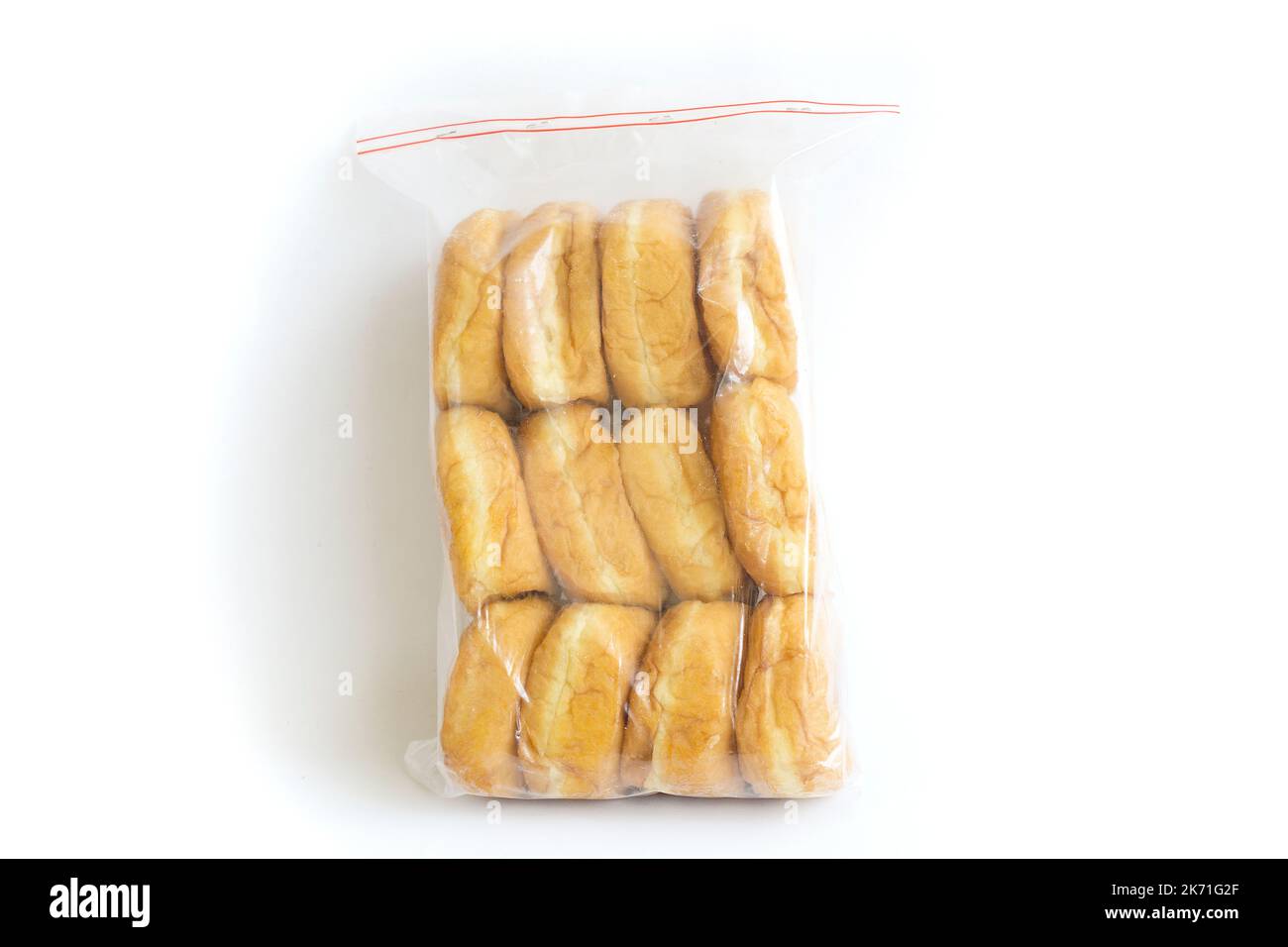 Homemade frozen food donuts packaged in plastic for sale in the market ...
