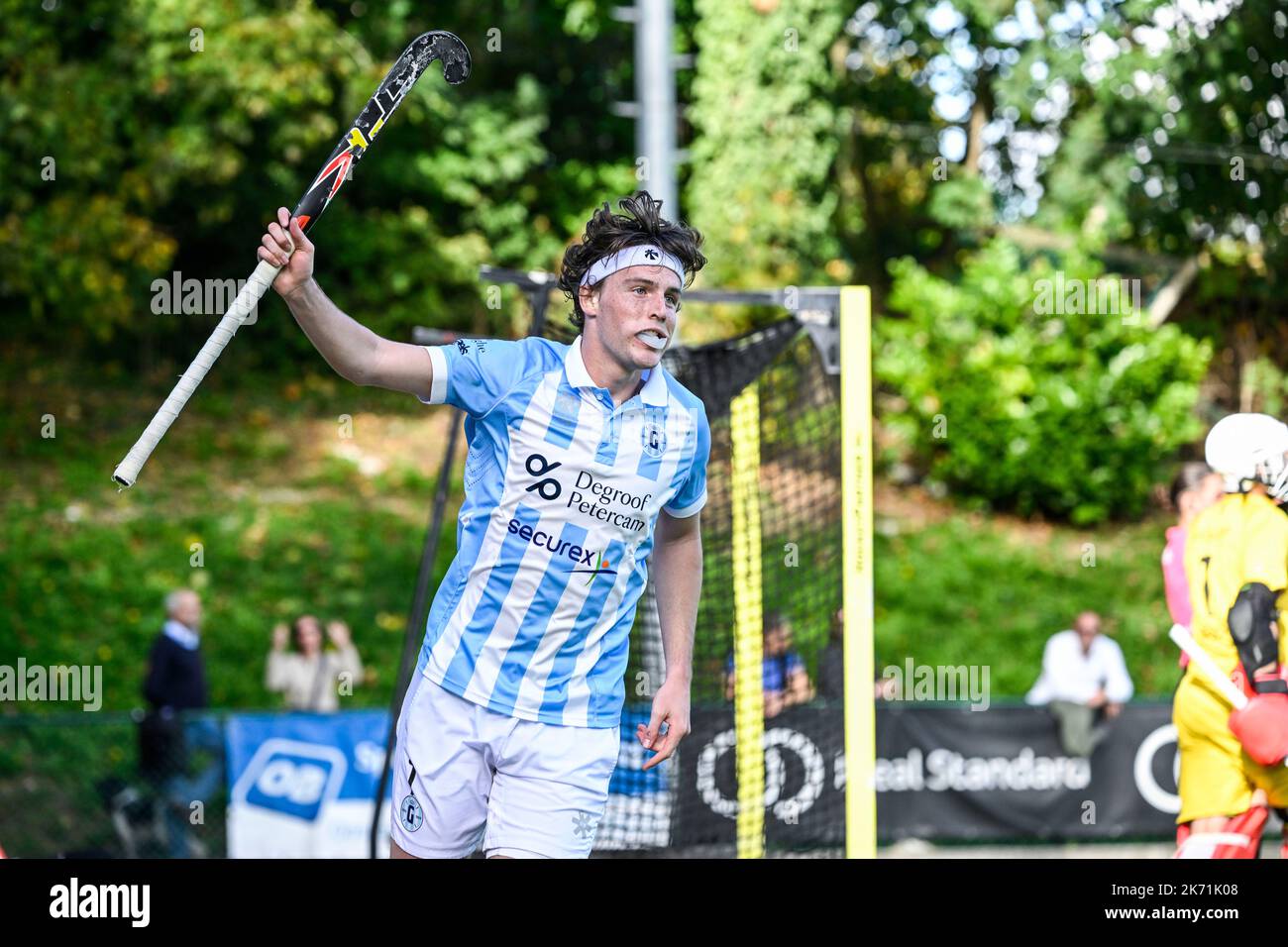 Gantoise's Guillaume Hellin celebrates after scoring during a hockey ...