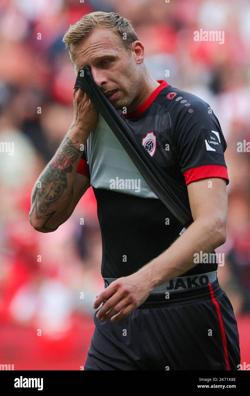 Antwerp's Ritchie De Laet looks dejected after a soccer match between ...
