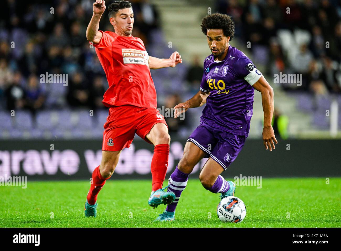 Dender's Lennard Hens and Beerschot's Ryan Sanusi pictured in action ...