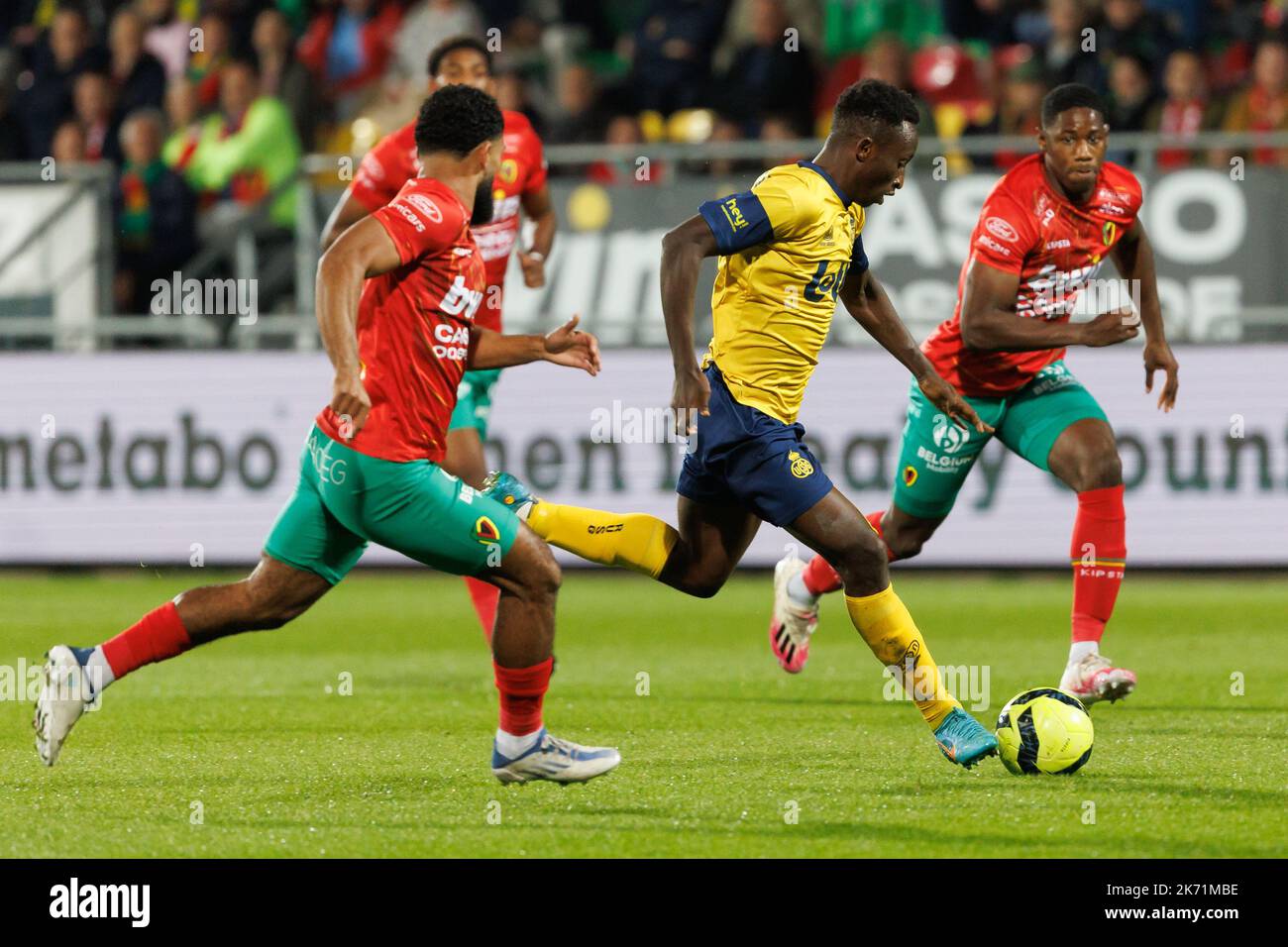 Oostende's Theo Matam Ndicka and Union's Lazare Amani fight for the ...