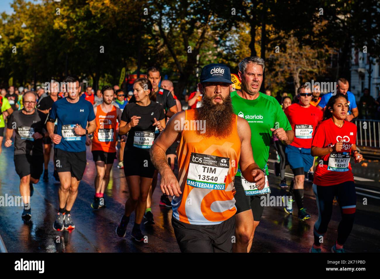 A participant with a big beard is seen running the marathon. More than ...