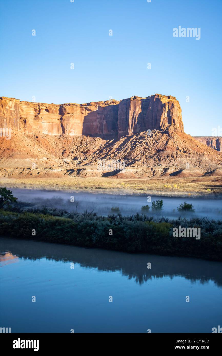 Early morning sunlight on a crisp October day in the Moab desert along ...