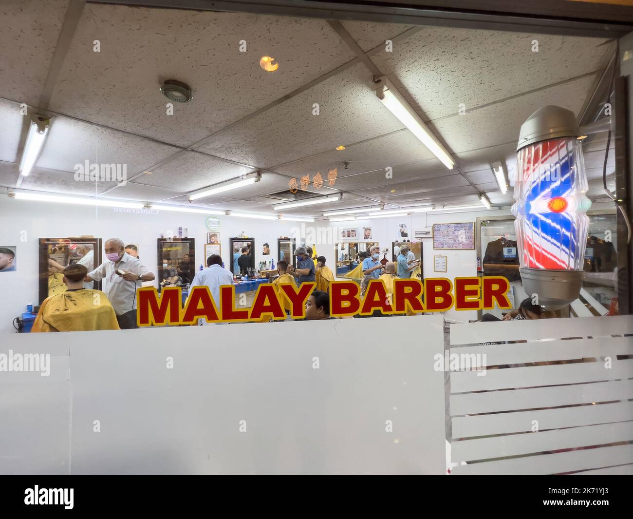 Malay barbers hi-res stock photography and images - Alamy