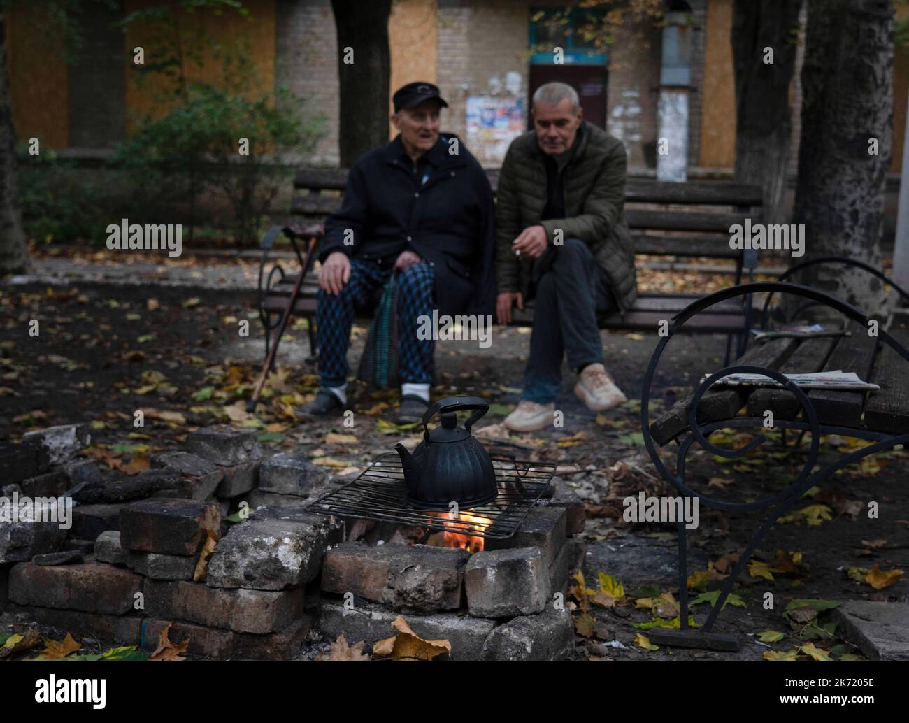 Bakhmut, Ukraine. 09th Oct, 2022. Yara (R) seen sitting with his 85 ...