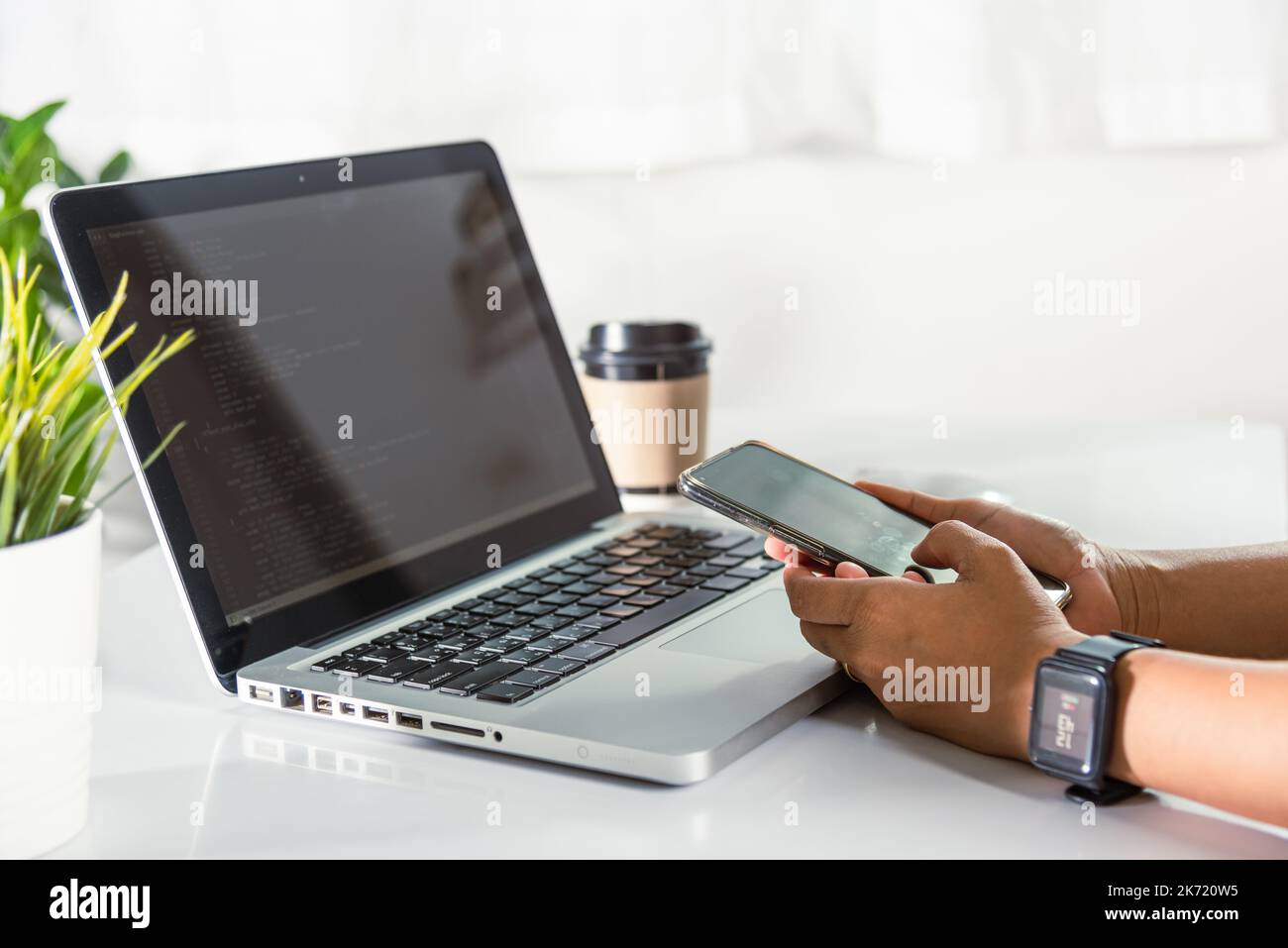 Programmer Woman Looking Mobile Phone Program Code At Workplace Software Developer Hands Typing