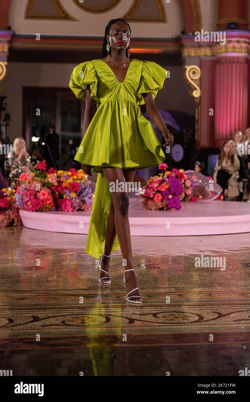 A model wearing an outfit by designer Aje walks the runway during the ...