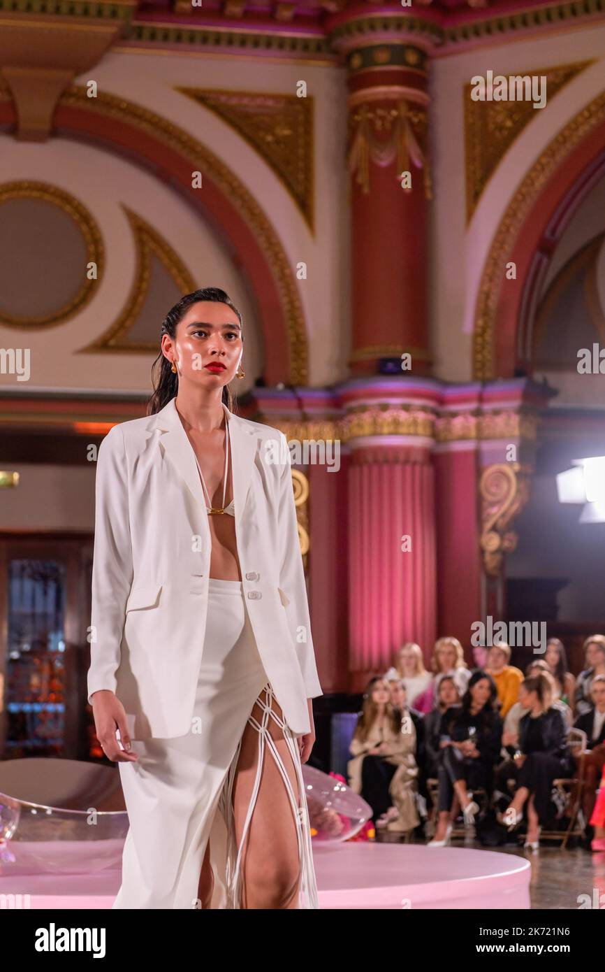 A model wearing an outfit by designer Maara Collective walks the runway ...