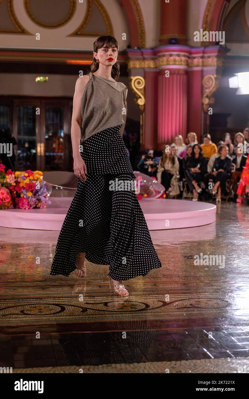 A model wearing an outfit by designer Bianca Spender walks the runway ...