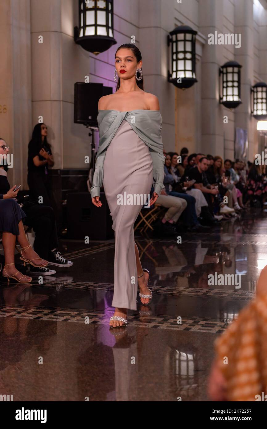 A model wearing an outfit by designer Bianca Spender walks the runway ...