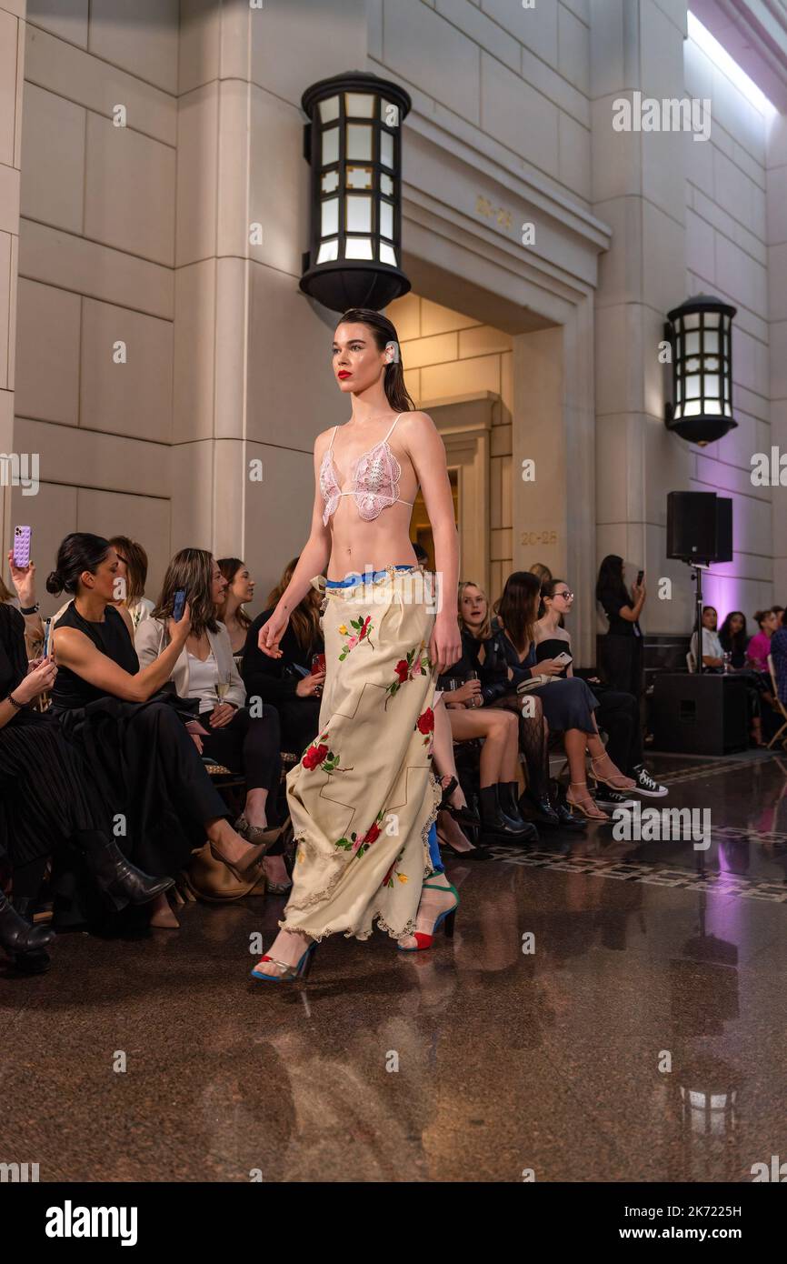 A model wearing an outfit by designer Nevenka walks the runway during ...