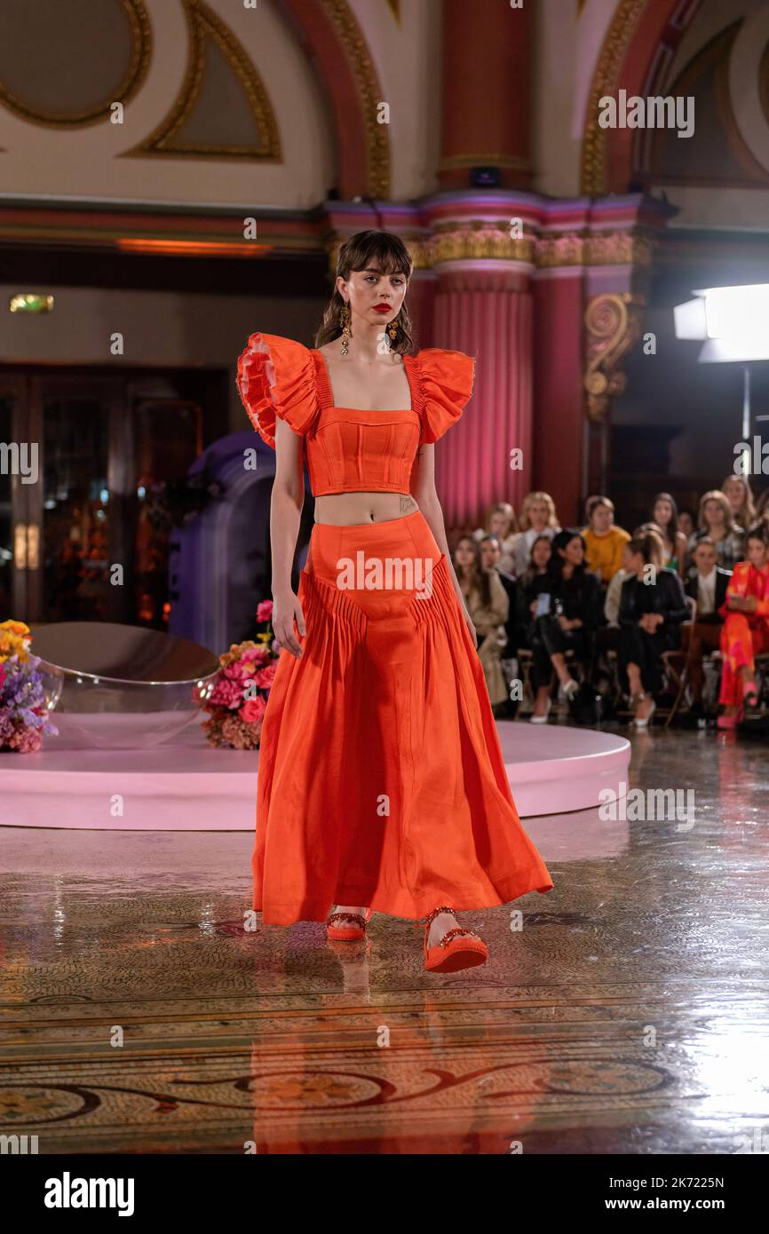 A model wearing an outfit by designer Aje walks the runway during the ...