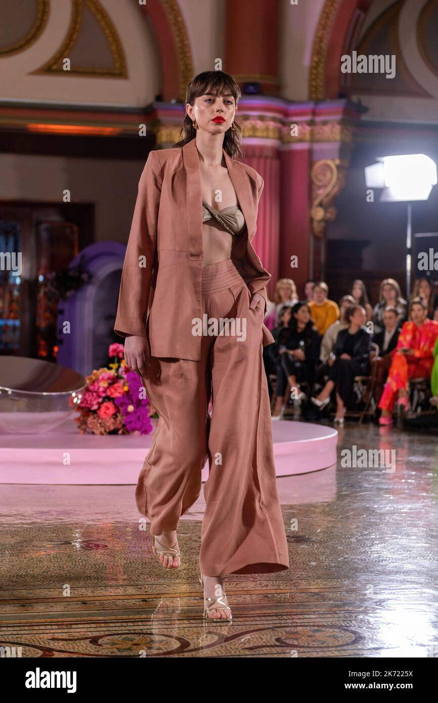 A model wearing an outfit by designer Maara Collective walks the runway ...